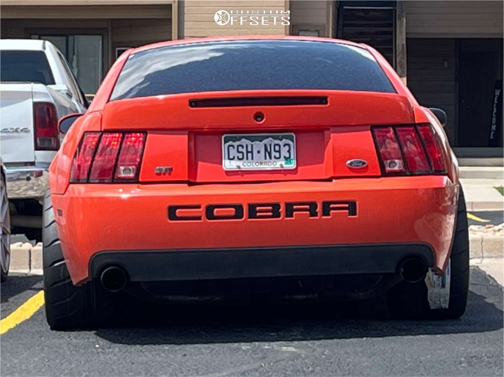 2004 Ford Mustang with 18x9.5 35 Konig Countergram and 295/30R18 Toyo ...