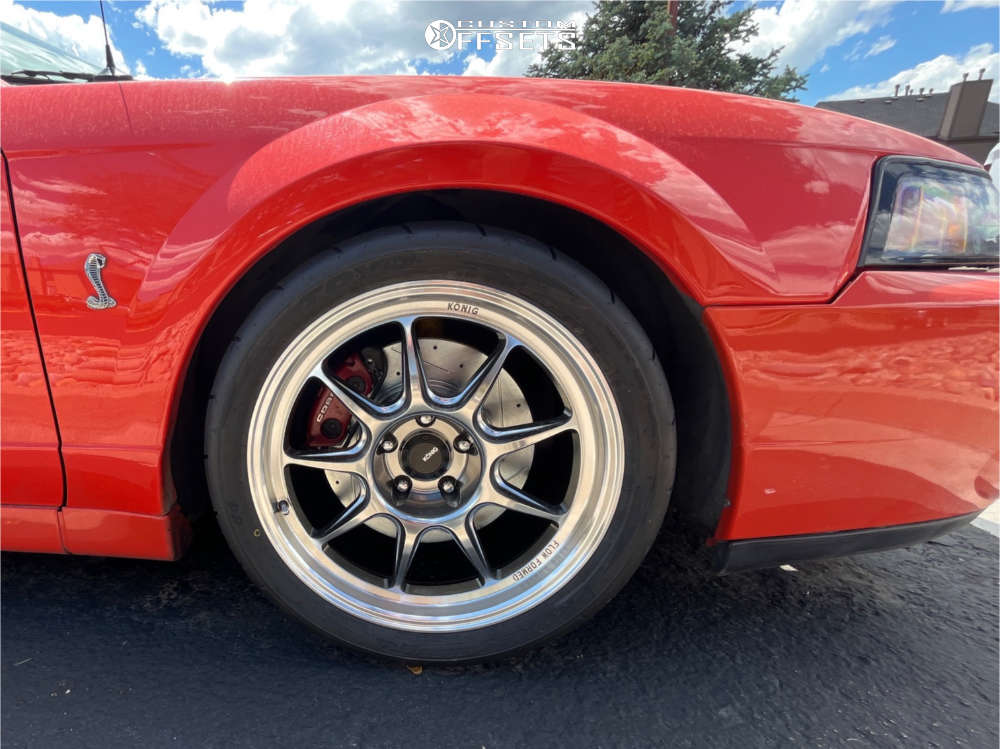 2004 Ford Mustang with 18x9.5 35 Konig Countergram and 295/30R18 Toyo ...