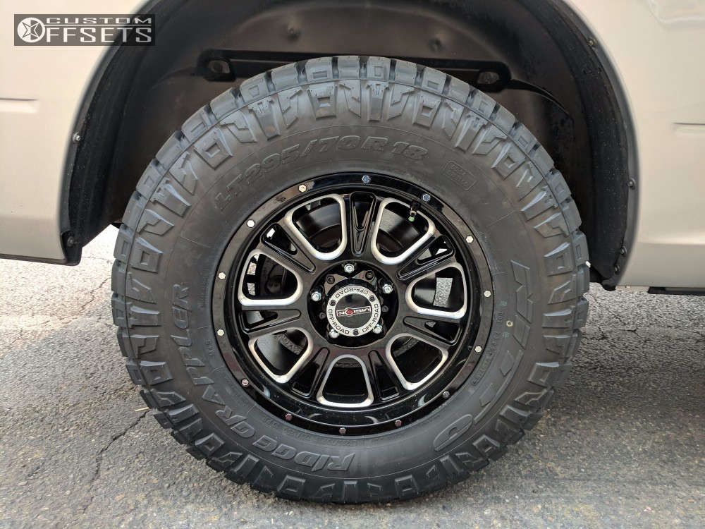 2011 Ram 1500 with 18x8.5 18 Vision Fury and 285/65R18 Nitto Ridge ...