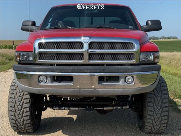 2002 Dodge Ram 2500 with 20x12 -52 Method Mr605 and 36/13.5R20 ...