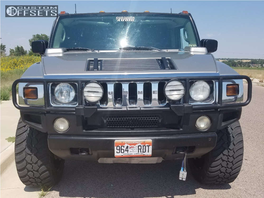 2003 HUMMER H2 with 22x12 -44 XD Rockstar Ii and 325/50R22 AMP Mud ...