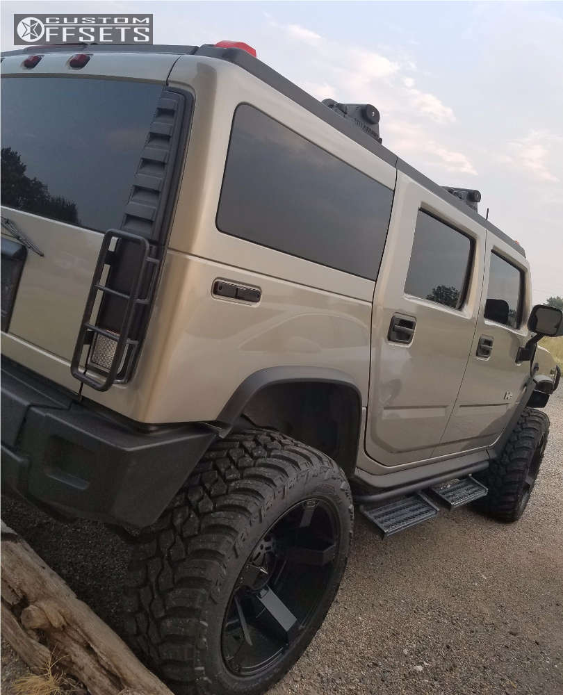 2003 HUMMER H2 with 22x12 -44 XD Rockstar Ii and 325/50R22 AMP Mud ...