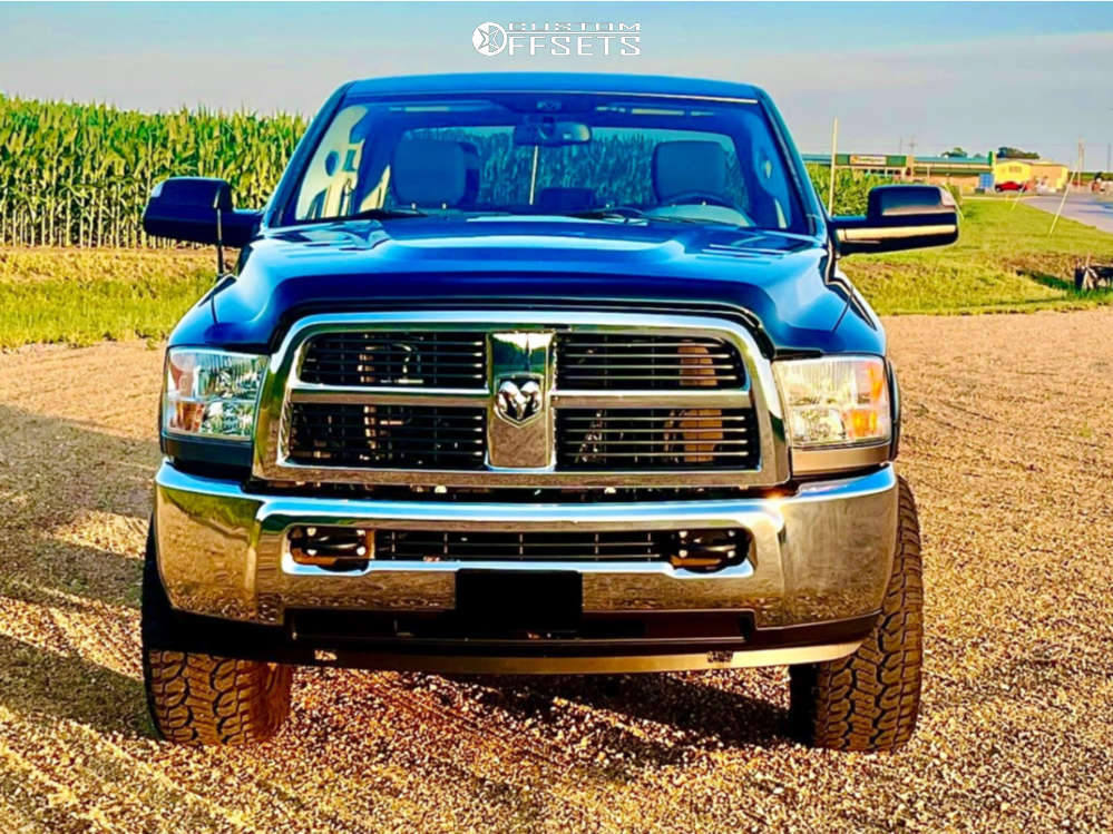 2012 Ram 2500 with 18x9 0 Helo He901 and 33/12.5R18 Radar Renegade RT ...