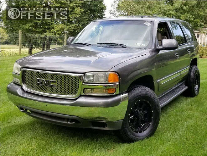2002 GMC Yukon with 16x8 -13 Tuff T15 and 275/70R16 Bridgestone Dueler ...