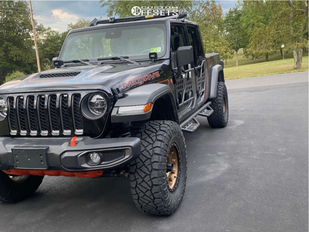 2021 Jeep Gladiator with 17x8.5 Method Mr305 and 35/12.5R17 Nitto Ridge ...