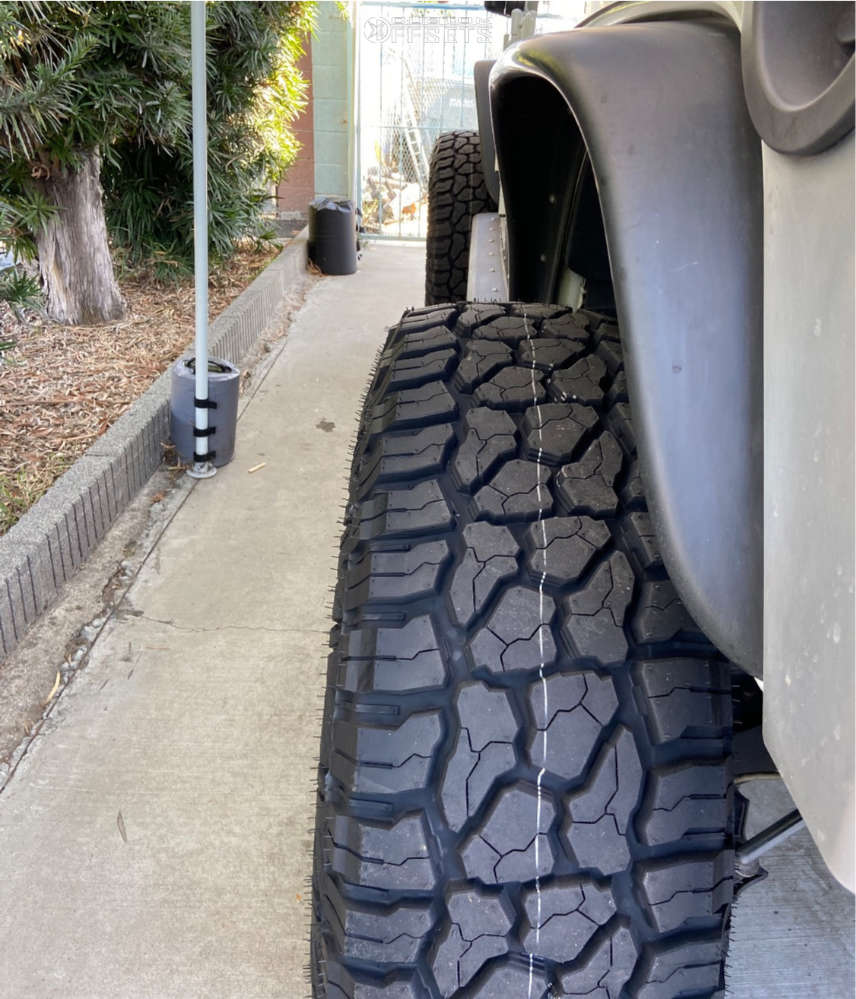 2014 Jeep Wrangler with 17x9 -38 KMC Km237 and 38/13.5R17 Falken ...