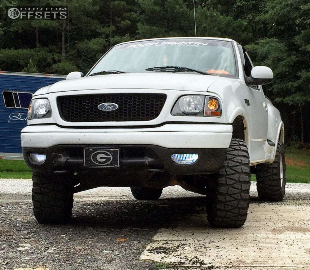 2002 Ford F-150 with 17x9 -12 Pacer Lt and 33/12.5R17 Nitto Mud ...
