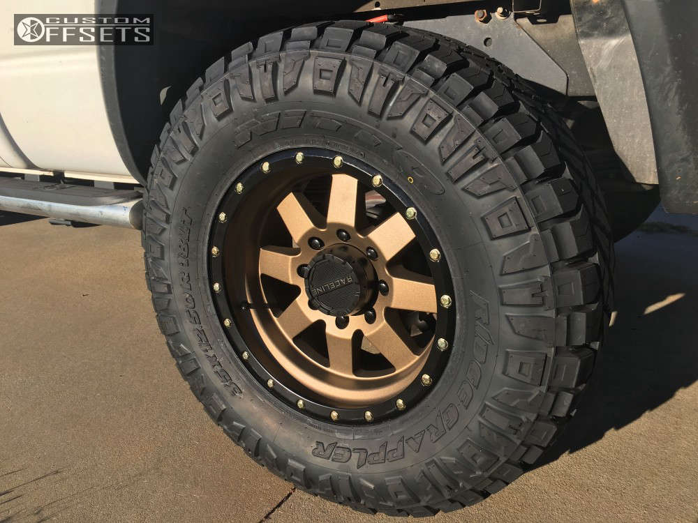 2008 Dodge Ram 2500 with 18x9 -12 Raceline Defender and 35/12.5R18 ...