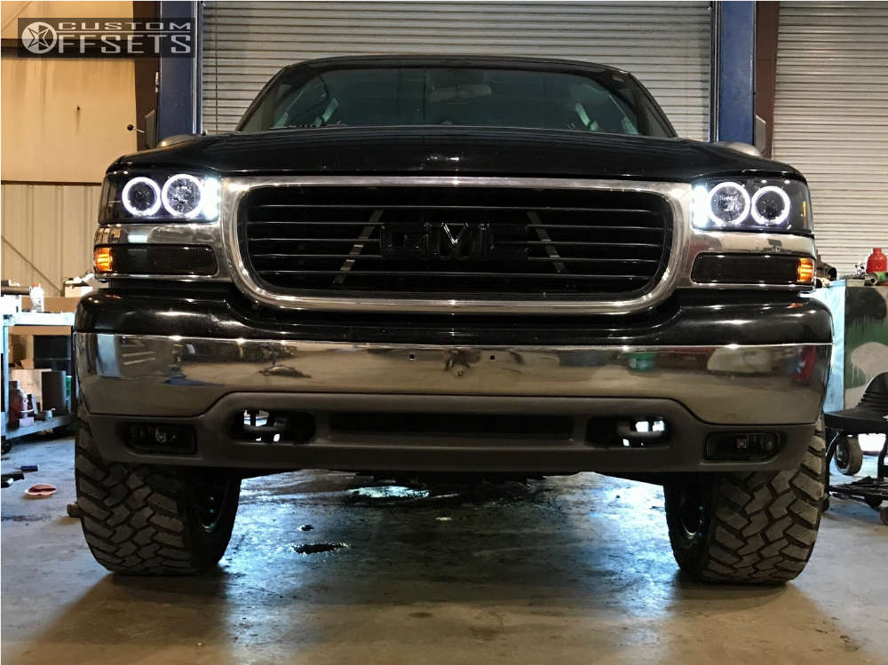 2001 GMC Sierra 1500 with 20x10 -14 Axe Offroad 507 and 285/55R20 Nitto ...