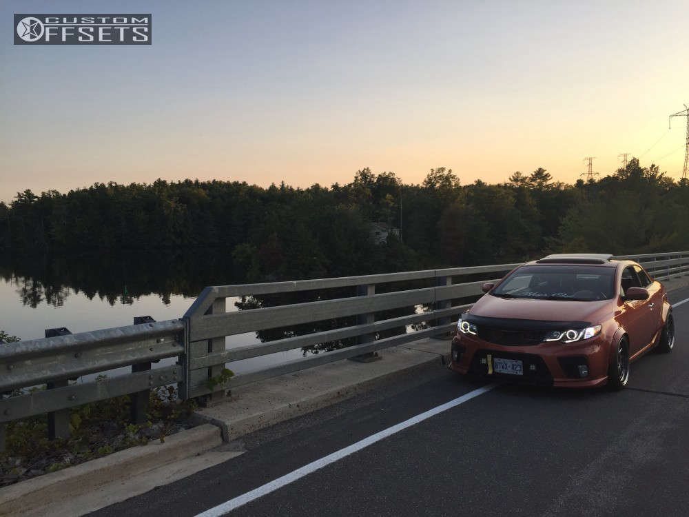 2011 Kia Forte Koup with 18x9.5 30 ESR Sr09 and 235/40R18 Michelin ...