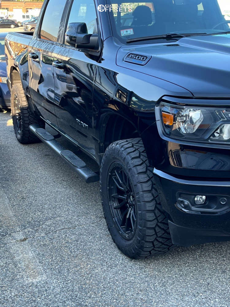 2023 Ram 1500 with 20x9 1 Fuel Rebel 6 and 33/12.5R20 Nitto Ridge ...