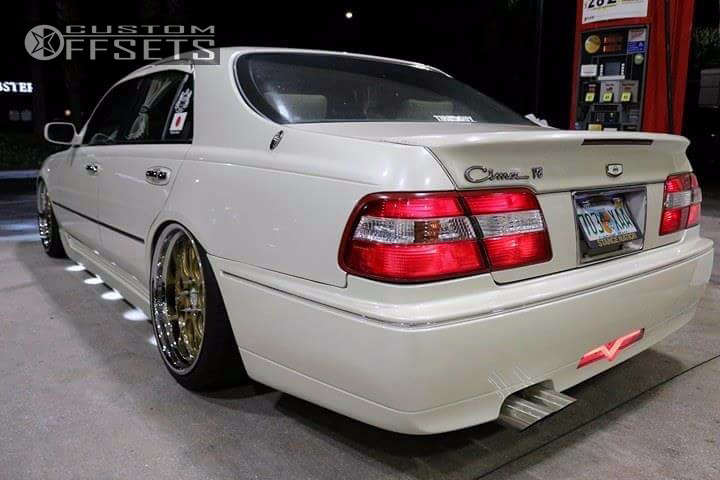 1997 INFINITI Q45 with 20x10 5 Rennen International and 255/30R20 ...