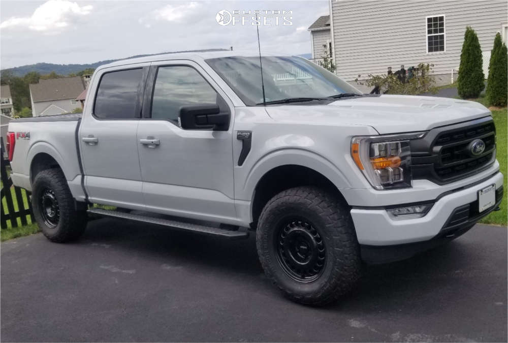 2022 Ford F-150 with 18x9 18 Rotiform STL and 295/70R18 Nitto Recon ...