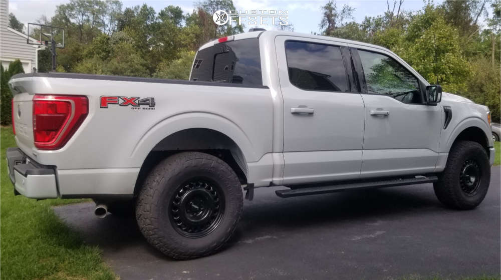 2022 Ford F-150 with 18x9 18 Rotiform STL and 295/70R18 Nitto Recon ...
