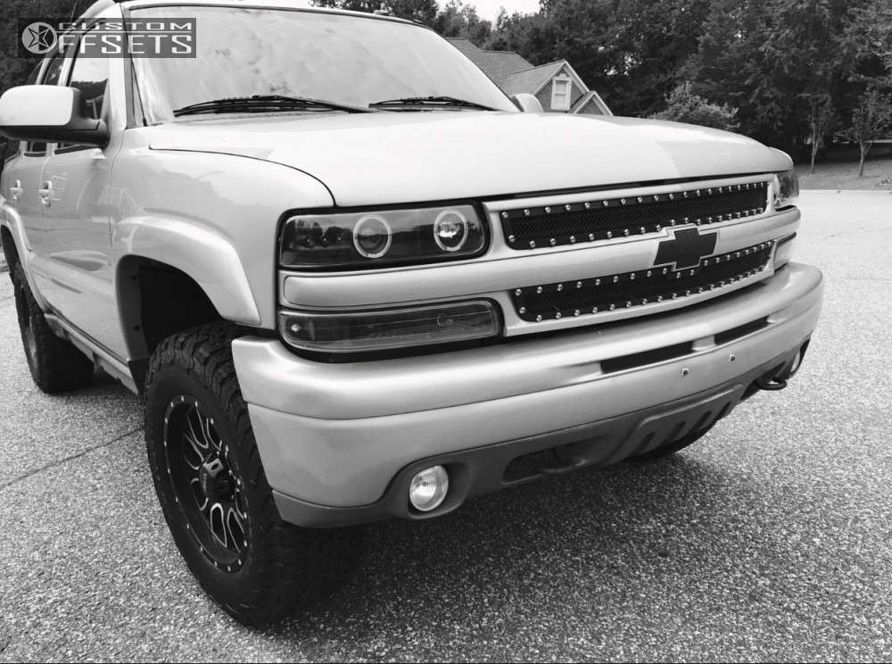 2004 Chevrolet Tahoe with 18x9 18 Helo He879 and 285/65R18 BFGoodrich ...