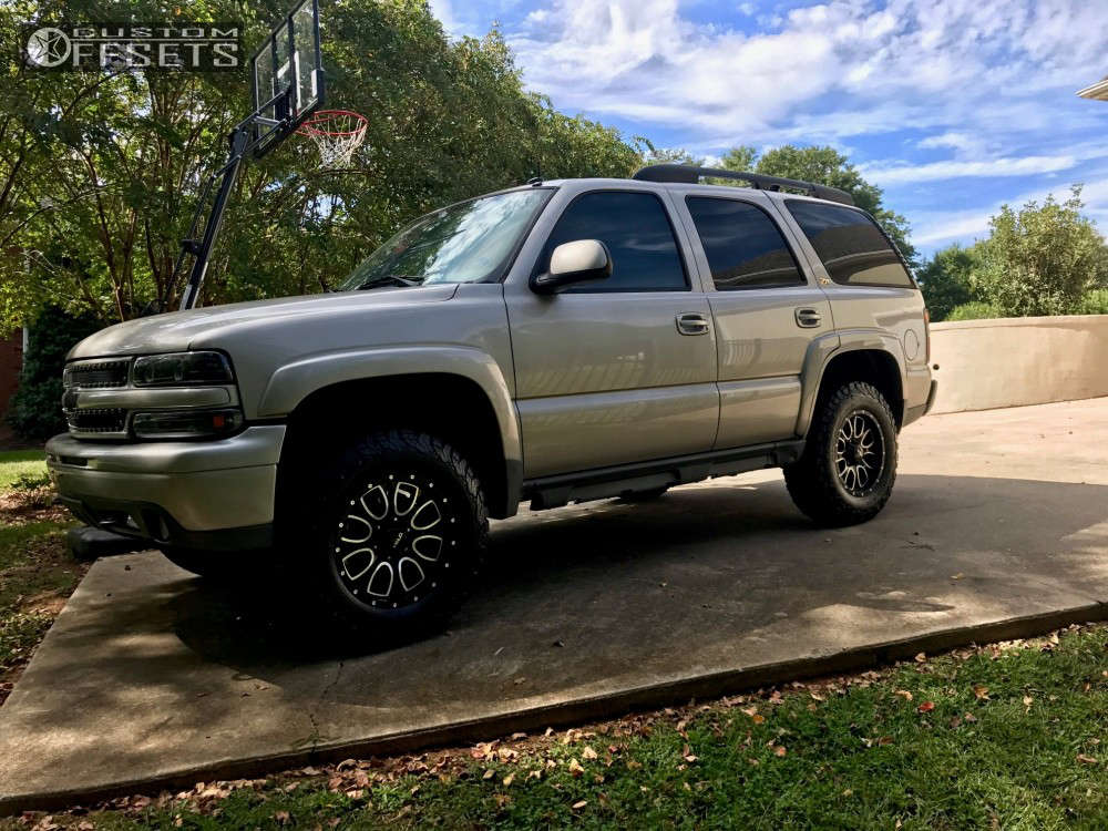 2004 Chevrolet Tahoe with 18x9 18 Helo He879 and 285/65R18 BFGoodrich ...