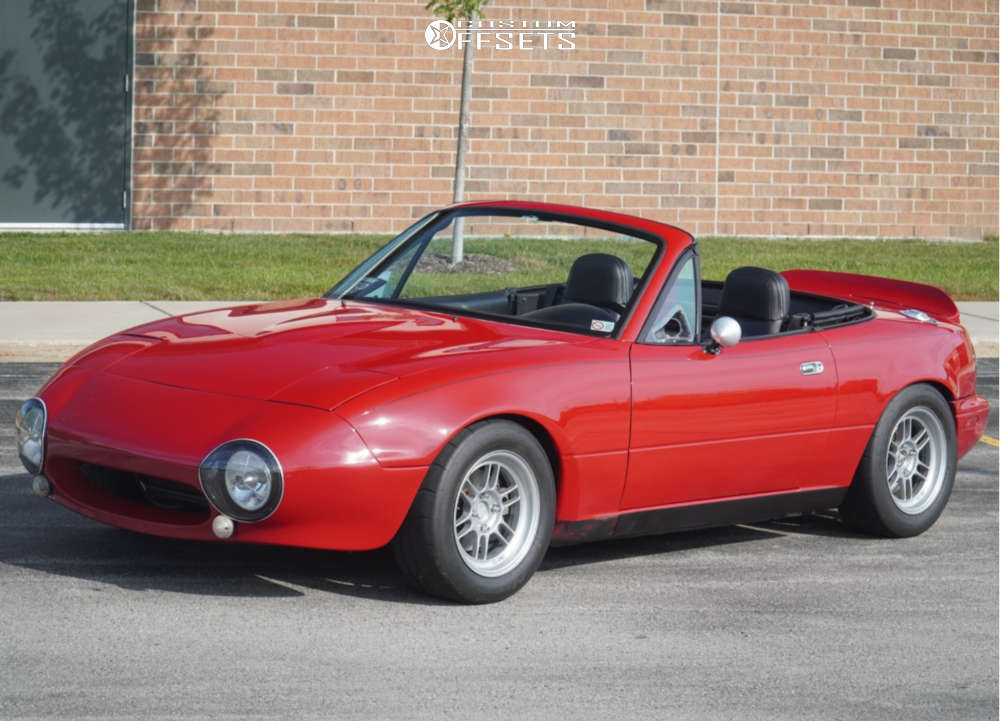 1997 Mazda Miata with 14x7 19 Enkei RPF1 and 205/55R14 Nitto Nt01 and ...