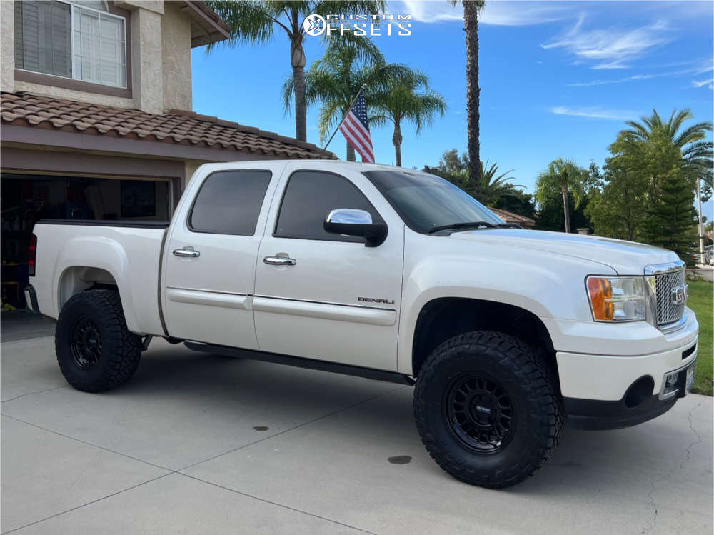 2011 GMC Savana 1500 with 17x8.5 0 Method Mr318 and 35/12.5R17 Nitto ...