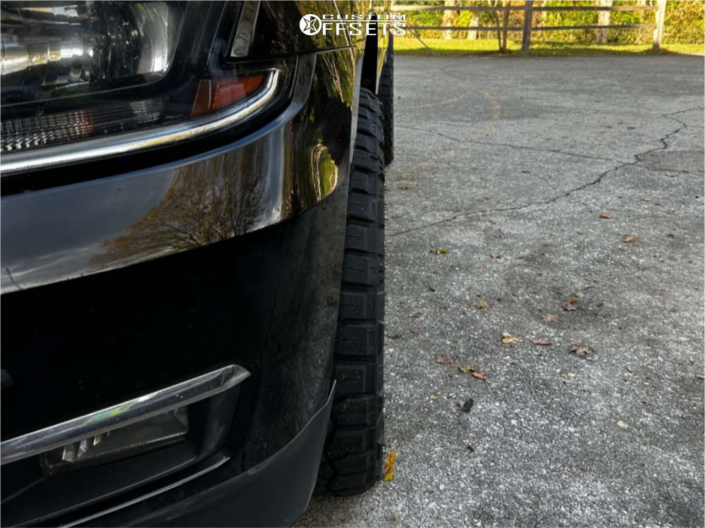 2017 Chevrolet Tahoe with 22x10 -19 TIS 547bm and 285/50R22 Nitto Ridge ...