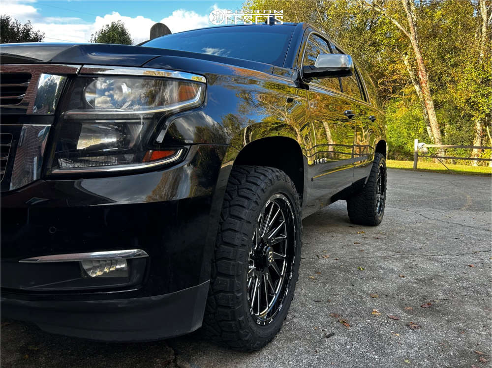 2017 Chevrolet Tahoe with 22x10 -19 TIS 547bm and 285/50R22 Nitto Ridge ...