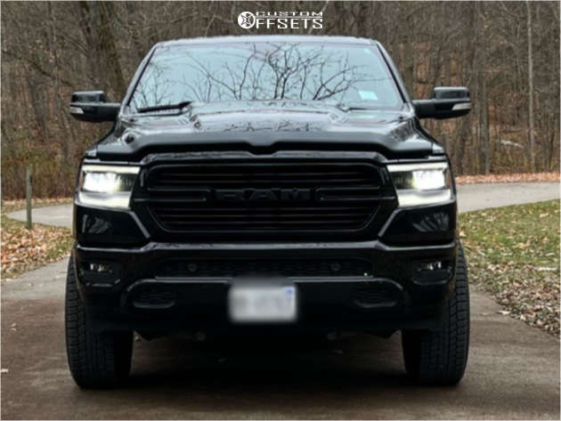 2020 Ram 1500 with 20x10 -25 Vision Armor and 275/65R20 General Grabber ...