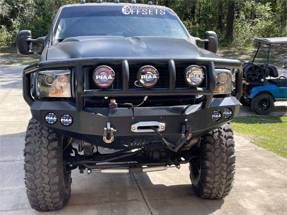 2001 Ford Excursion with 17x8.5 0 KMC Km235 and 42/14R17 Super Swamper ...