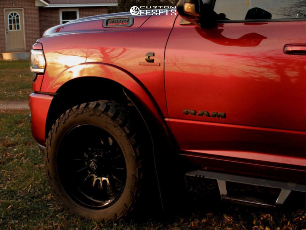 2020 Ram 2500 with 22x10 -19 Axe Offroad Chronus and 325/50R22 AMP Mud Terrain Attack MT A and ...