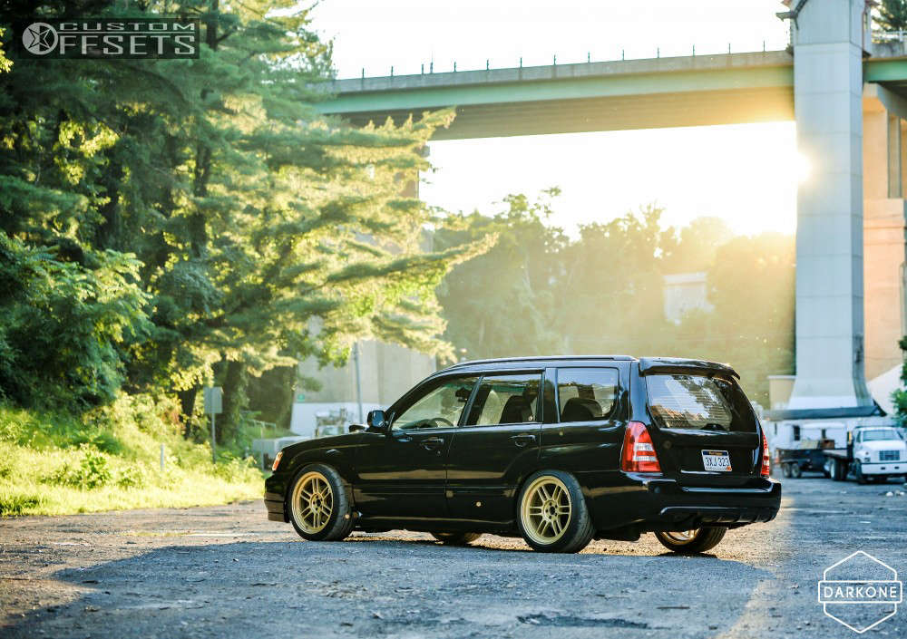 2004 Subaru Forester with 18x9.5 38 Enkei RPF1 and 245/40R18 Firestone ...