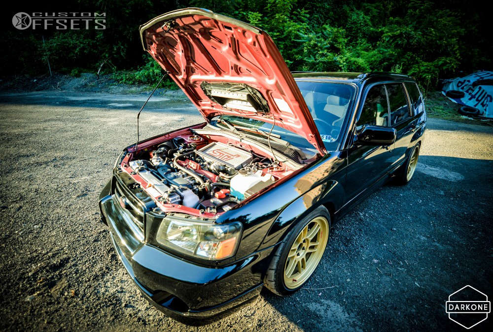 2004 Subaru Forester with 18x9.5 38 Enkei RPF1 and 245/40R18 Firestone ...