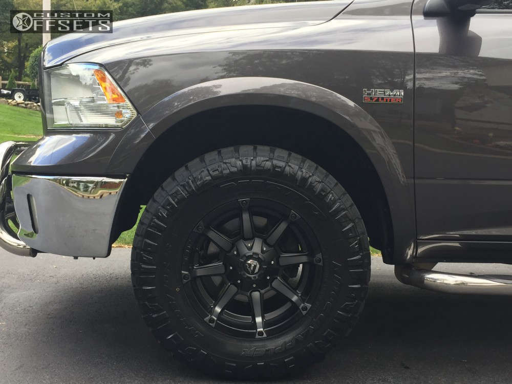 2015 Ram 1500 with 18x9 -12 Fuel Coupler and 295/70R18 Nitto Ridge ...