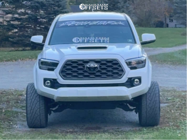 2023 Toyota Tacoma with 22x12 -44 TIS 547b and 285/35R22 Venom Power ...