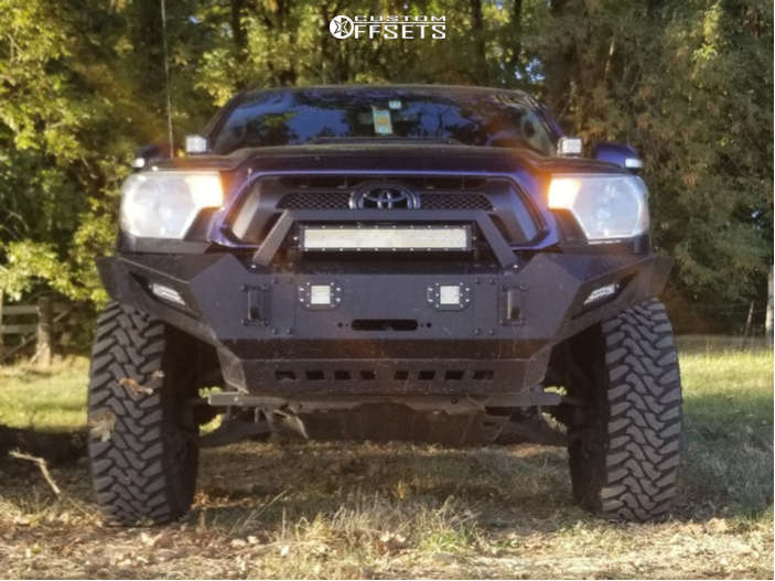 2013 Toyota Tacoma with 16x8 -10 9SiX9 Six-1 Deep and 285/75R16 Toyo ...