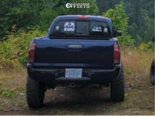 2013 Toyota Tacoma with 16x8 -10 9SiX9 Six-1 Deep and 285/75R16 Toyo ...