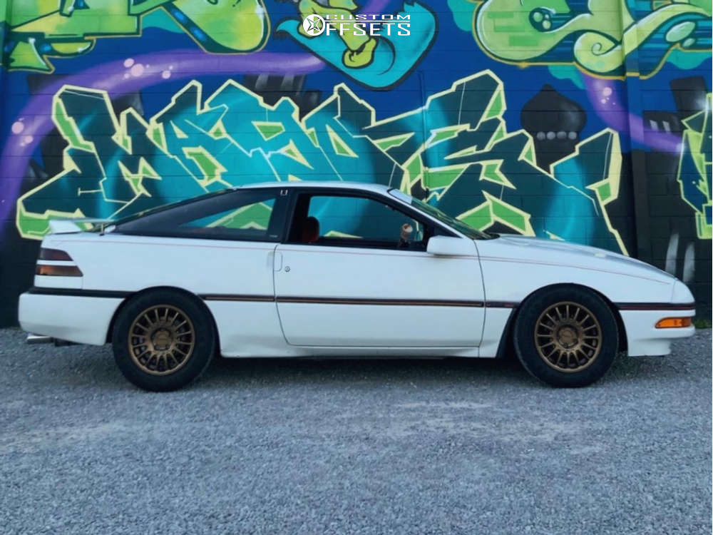 1989 Ford Probe with 15x7 38 Vision Monaco and 205/65R15 Cooper ...