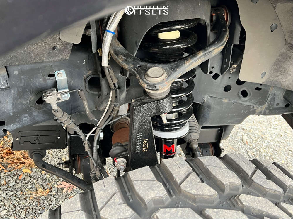 2021 Ford F-150 with 22x14 -76 TIS 544bm and 33/13.5R22 Versatyre MXT ...