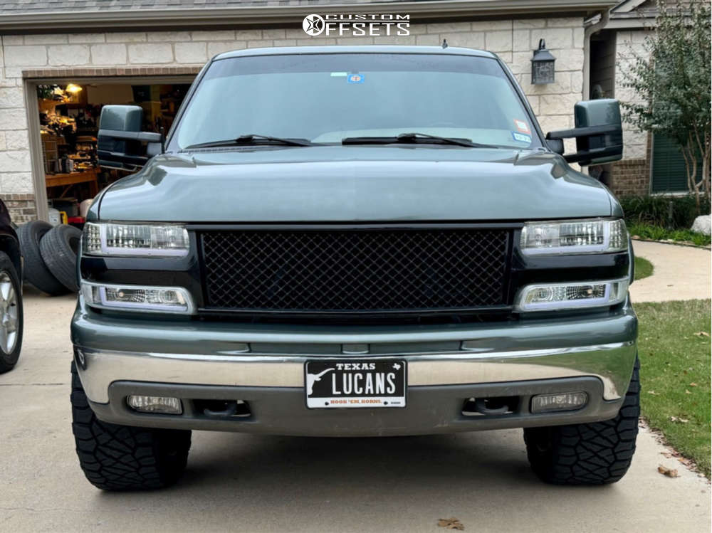 2002 Chevrolet Suburban 1500 with 22x10 -13 Fuel Rebel 6 and 33/12.5R22 ...