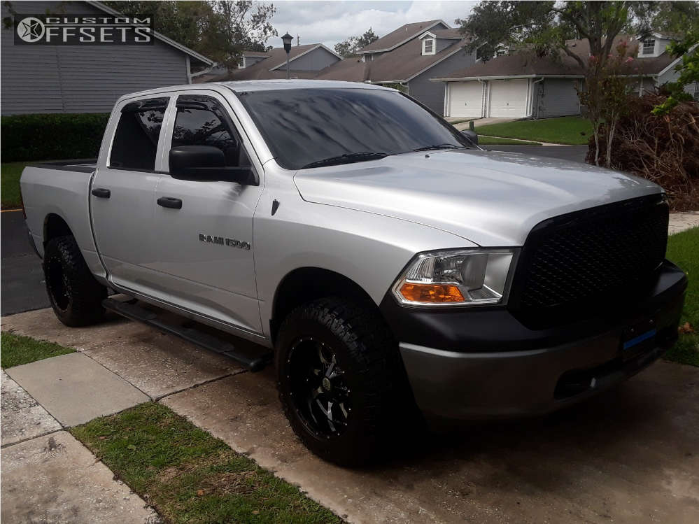 2011 Ram 1500 with 18x10 -24 Moto Metal Mo970 and 275/65R18 Kanati ...