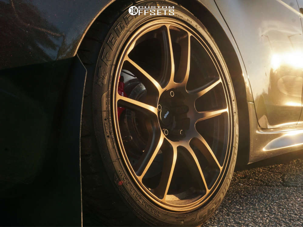 2013 Mitsubishi Lancer with 18x9.5 25 Konig Heliogram and 265/35R18 ...