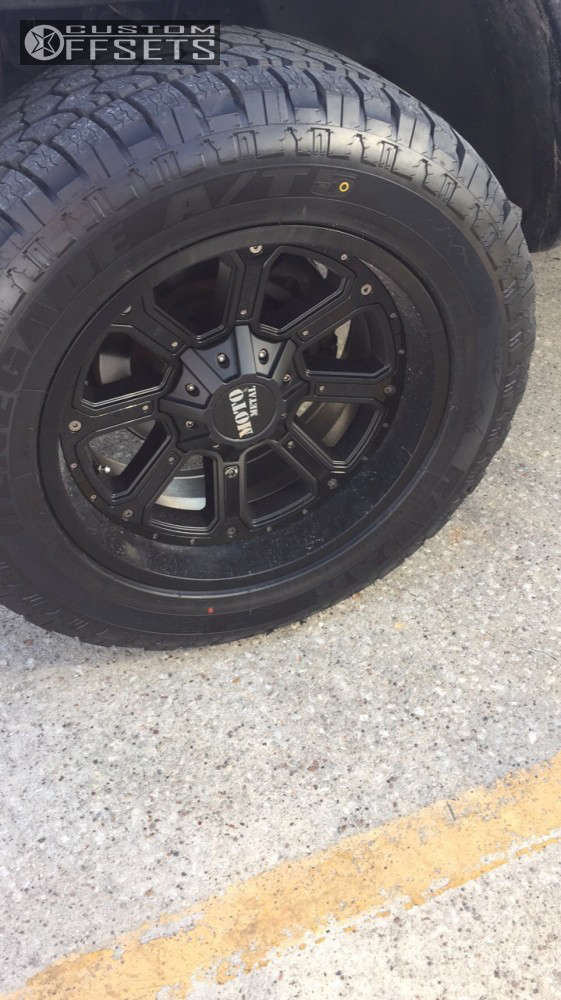 2002 Dodge Ram 1500 with 20x10 -24 Moto Metal Mo984 and 305/55R20 Radar ...