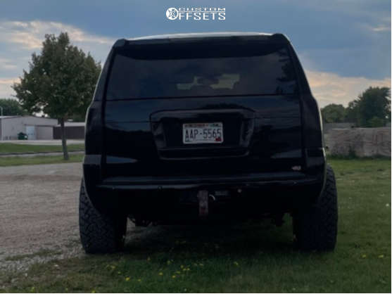 2017 Chevrolet Tahoe with 22x12 -44 Hostile Dagr and 33/12.5R22 Venom ...