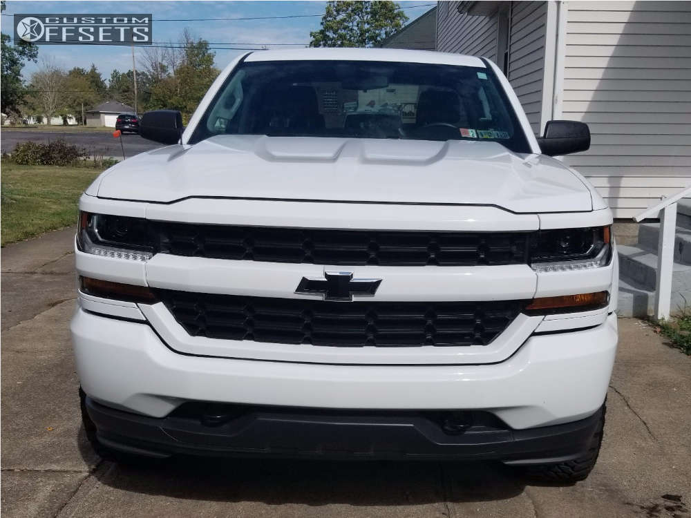 2016 Chevrolet Silverado 1500 with 20x10 -25 Toxic Razr and 33/12.5R20 ...