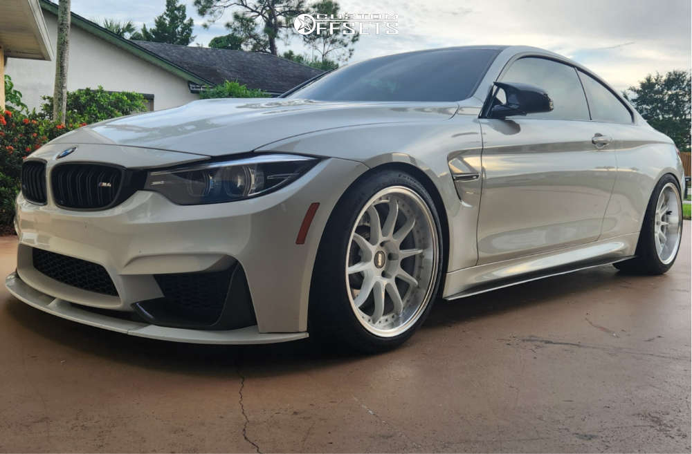 2018 BMW M4 with 19x9.5 22 ESR Cs12 and 265/35R19 Continental ...