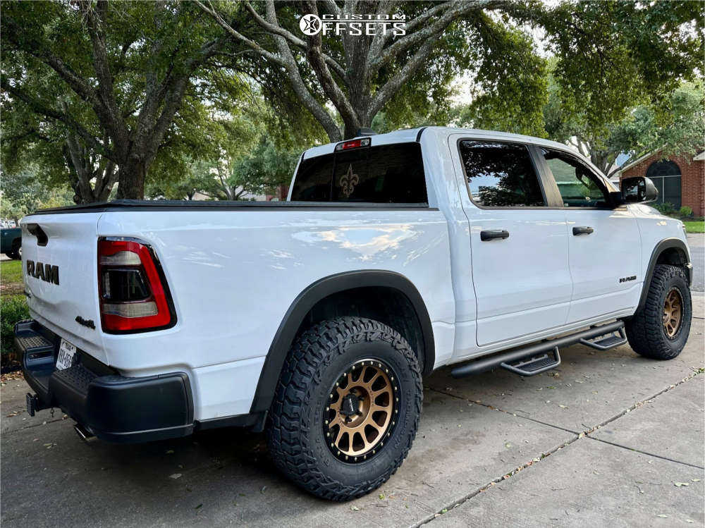 2021 Ram 1500 with 18x9 -12 Method Mr305 and 295/70R18 Mickey Thompson ...