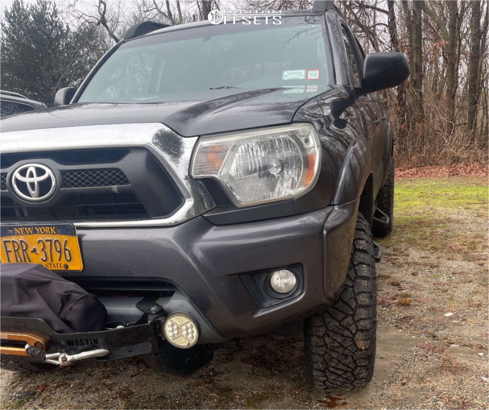 2013 Toyota Tacoma with 17x9 12 Mamba M27 and 265/70R17 Nitto Ridge ...