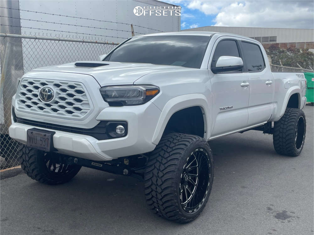 2023 Toyota Tacoma with 22x12 -44 TIS 547bm and 33/12.5R22 AMP Mud ...
