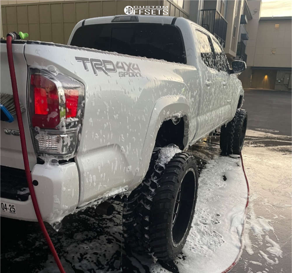 2023 Toyota Tacoma with 22x12 -44 TIS 547bm and 33/12.5R22 AMP Mud ...