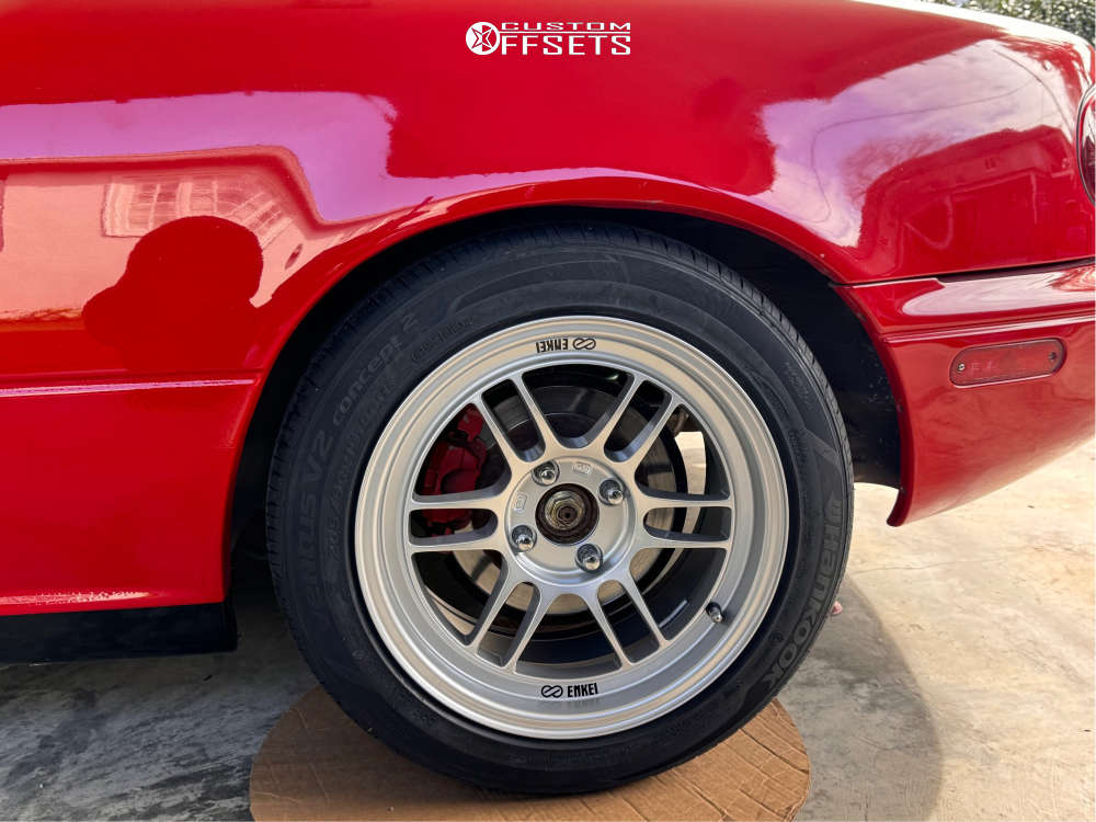 1996 Mazda Miata with 15x8 28 Enkei Rpf1 and 205/50R15 Hankook Ventus V2 Concept 2 and Coilovers ...