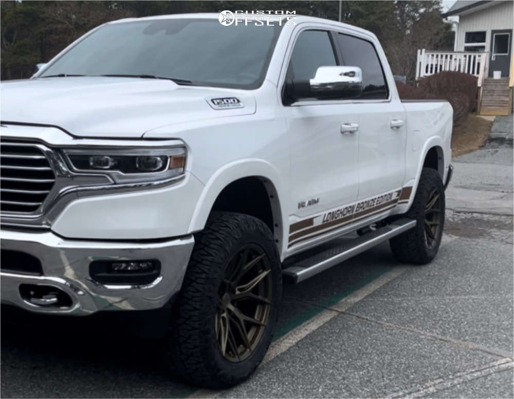 2023 Ram 1500 with 22x10 -18 Vossen Hf6-4 and 35/12.5R22 Radar Renegade ...