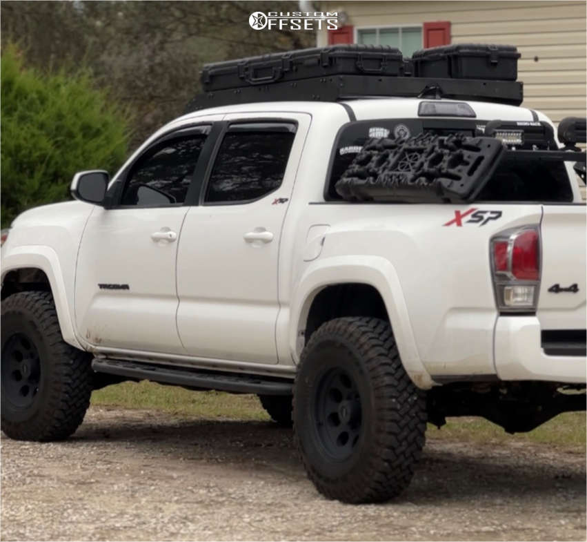 2019 Toyota Tacoma with 16x8 -12 Pro Comp 69 and 255/85R16 Falken ...