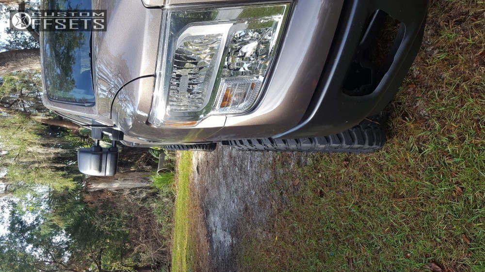 2017 Nissan Titan XD with 20x9 18 Mayhem Rampage and 33/12.5R20 Atturo ...